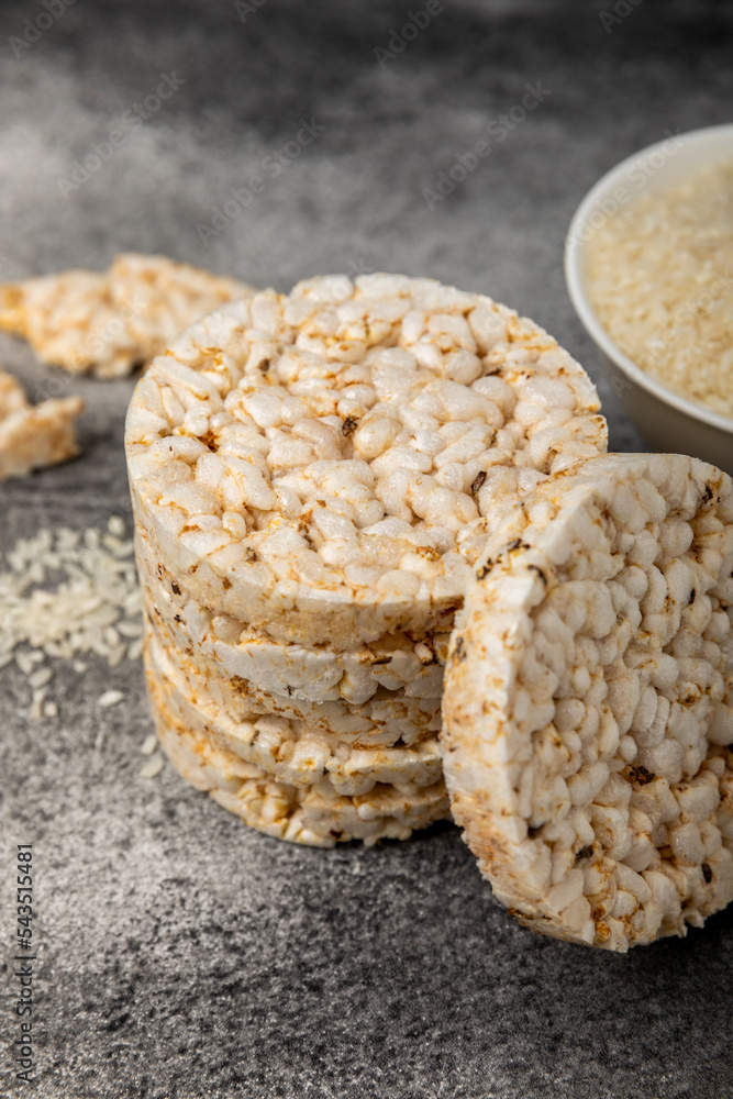 Round rice cakes on a black table. Crispbread.Puffed rice bread. diet ...
