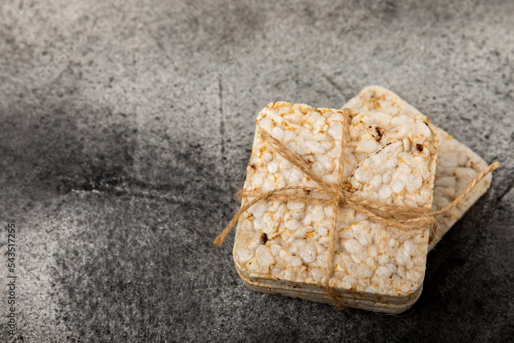 Round rice cakes on a black table. Crispbread.Puffed rice bread. diet ...