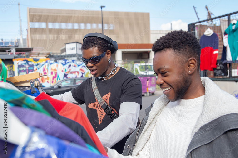 Two black transgender friends at a vintage market. Stock Photo | Adobe ...
