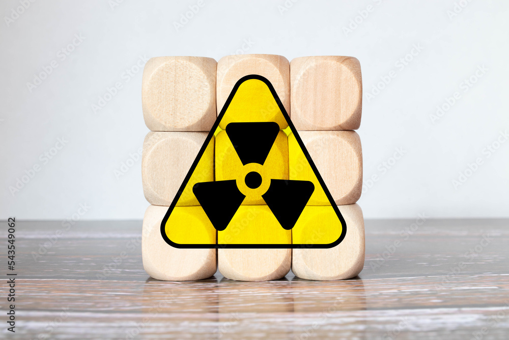 Radioactive ionizing radiation danger symbol painted on the old massive ...