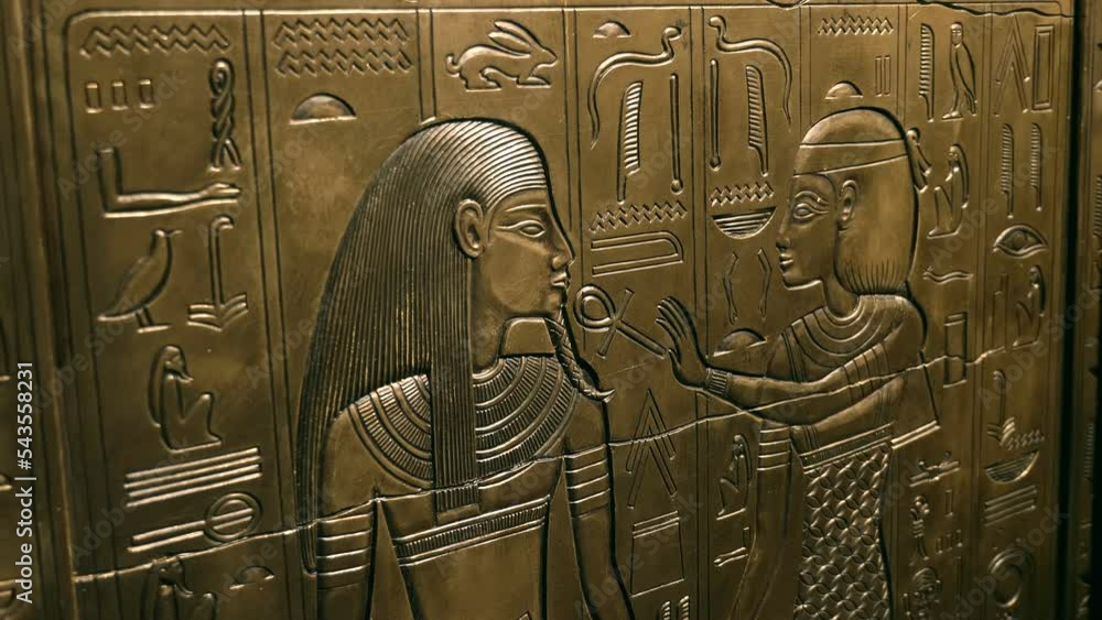 Golden ancient Egyptian frescoes on the walls of tombs and pyramids ...