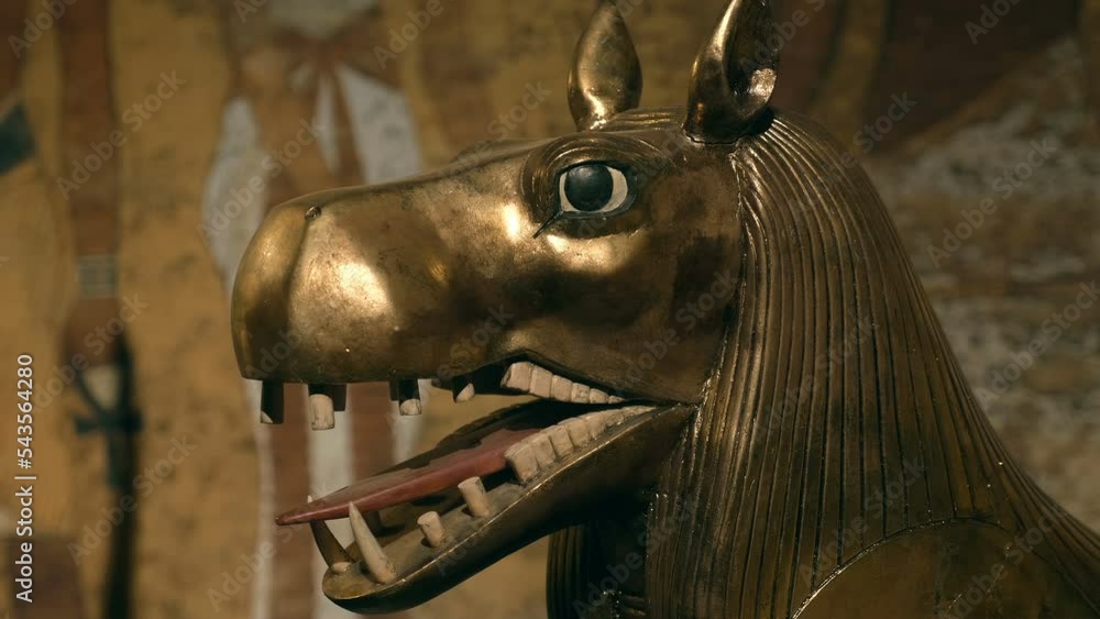 Golden ceremonial bed of the goddess Ammut on the background of ...