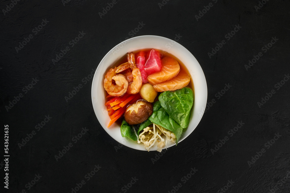 Japanese traditional soup miso shiru with cabbage, shrimp, squid ...