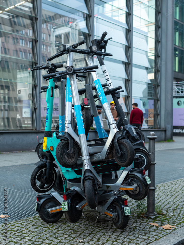 Motorized electric scooters of a Scooter-sharing system piled on a ...