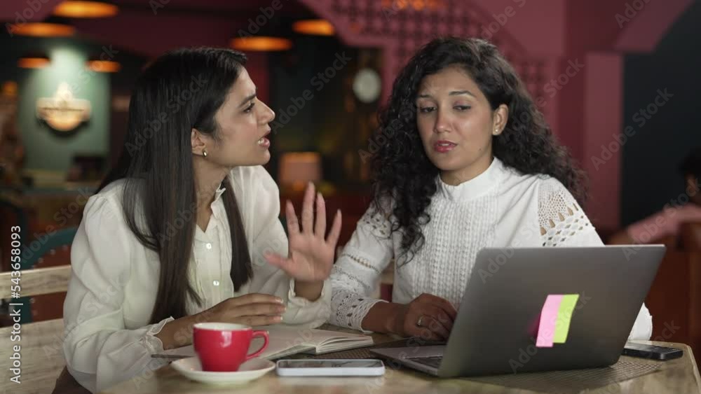 Anger Indian female boss shouting at girl employee pointing at report ...