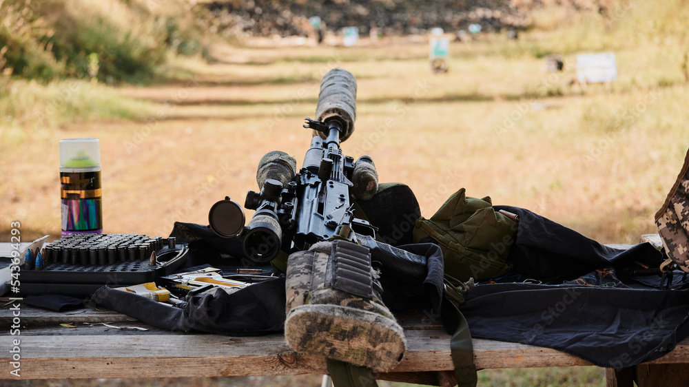 Kalashnikov assault rifle in a deep modification with a silencer and an ...