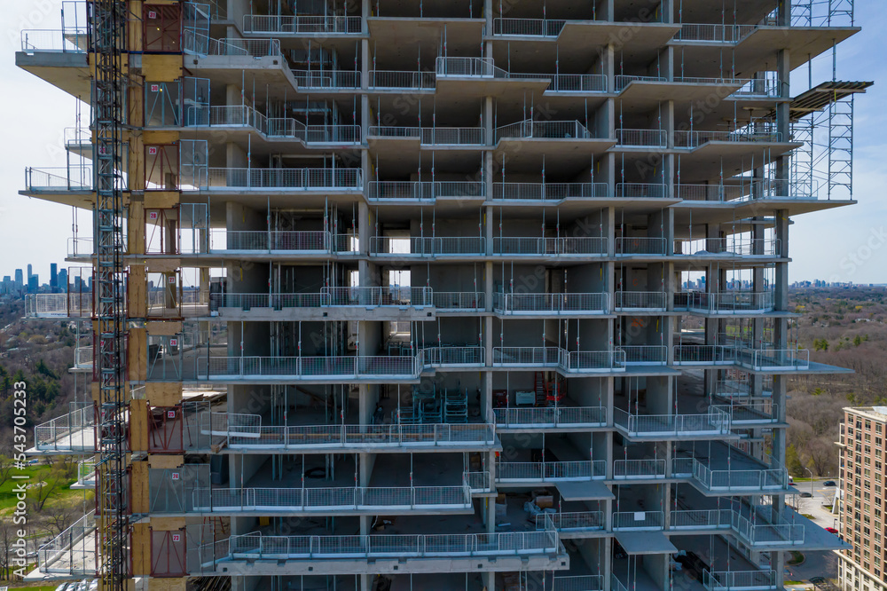 Empty construction site, incomplete high rise building with beams made ...