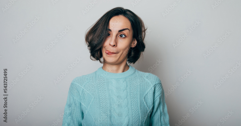 Silly and crazy woman making funny face and squinting eyes. Funny cute ...