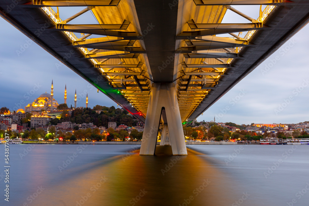 New Halic Metro Bridge at summer night blue sky and city lights in ...