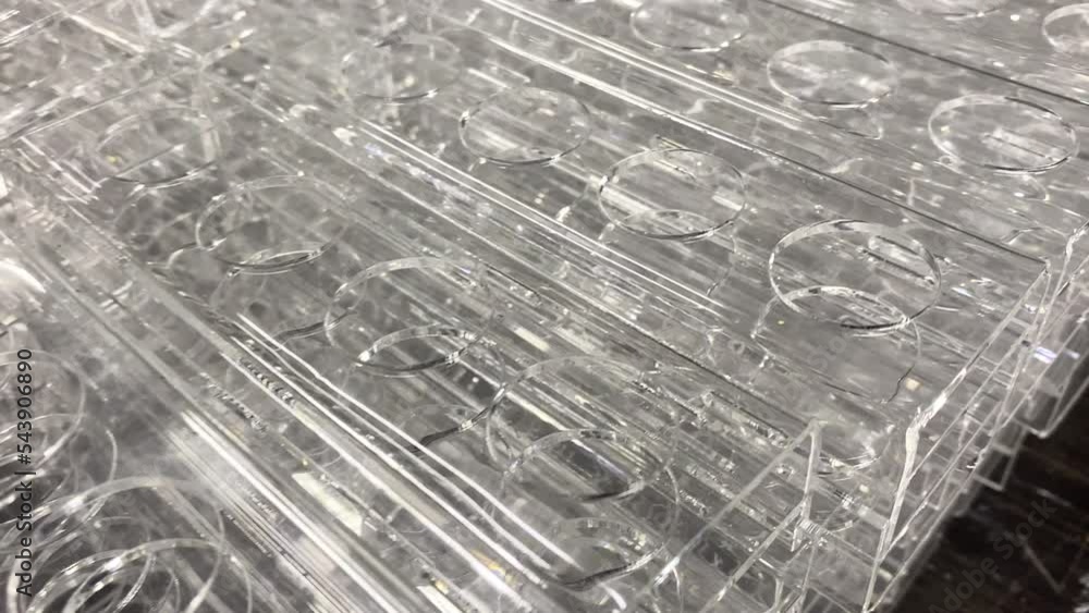 Products made of transparent plexiglass on the table. Production of pos ...