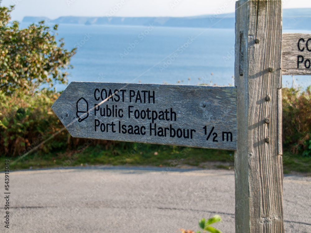Signpost on the cornish coast path between Port Gaverne and Port Isaac ...