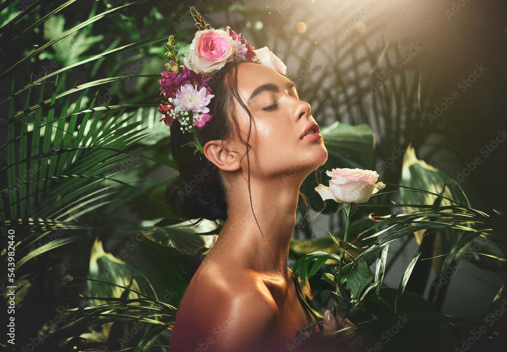 Flower, crown and woman in studio for skincare, beauty and relax, zen and cosmetics in jungle ...