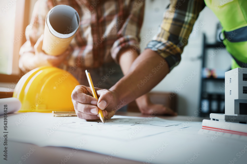 Engineers are consulting the team to design an architectural structure ...