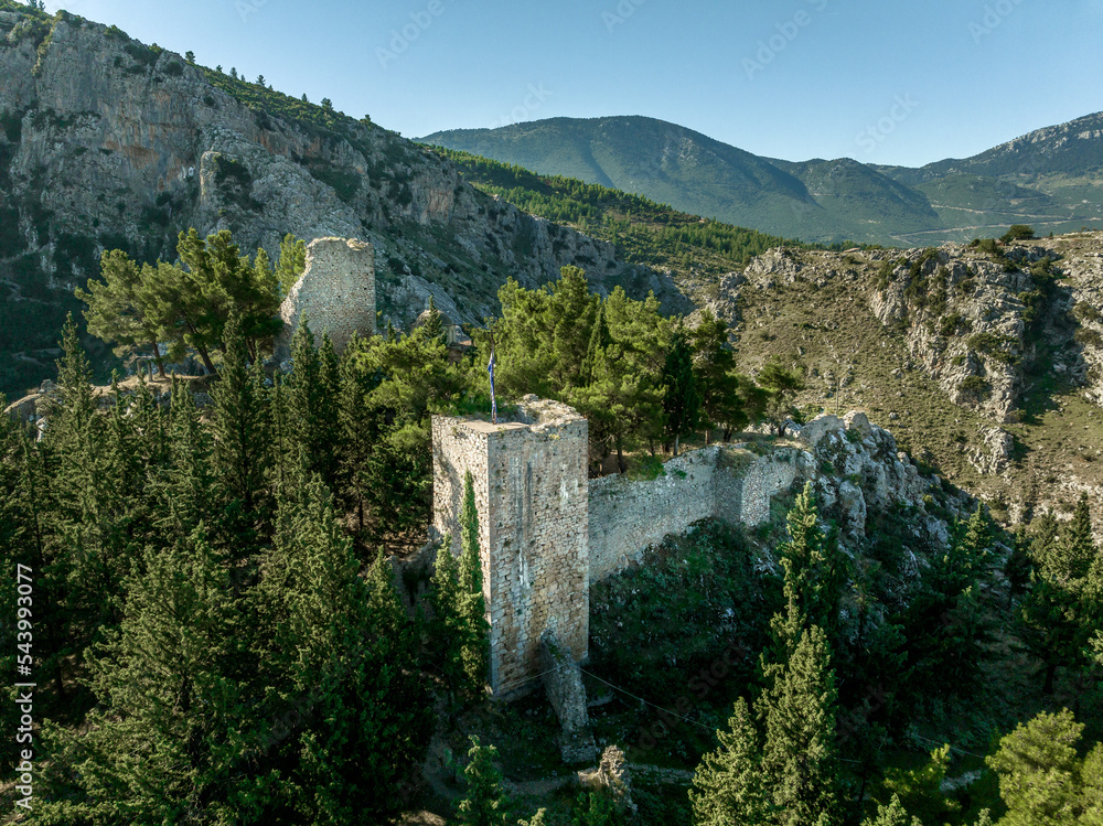Aerial view of ruined medieval hilltop castle in Livadia Greece, built ...