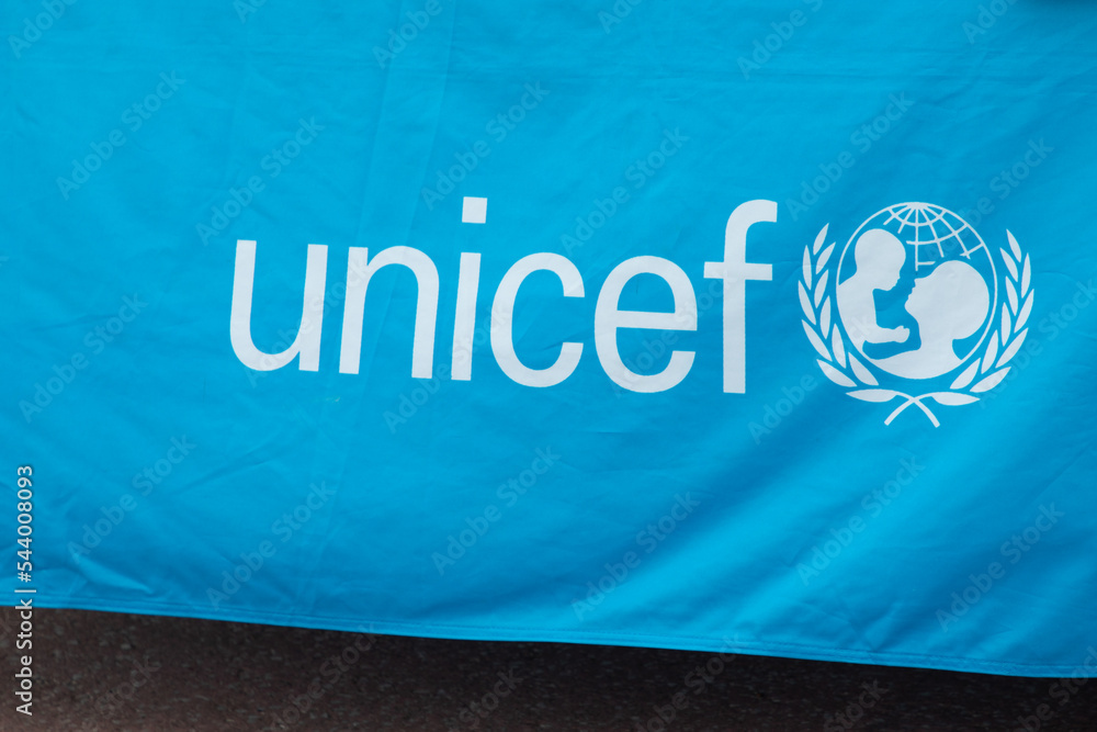 unicef sign brand and text logo on building international organization ...