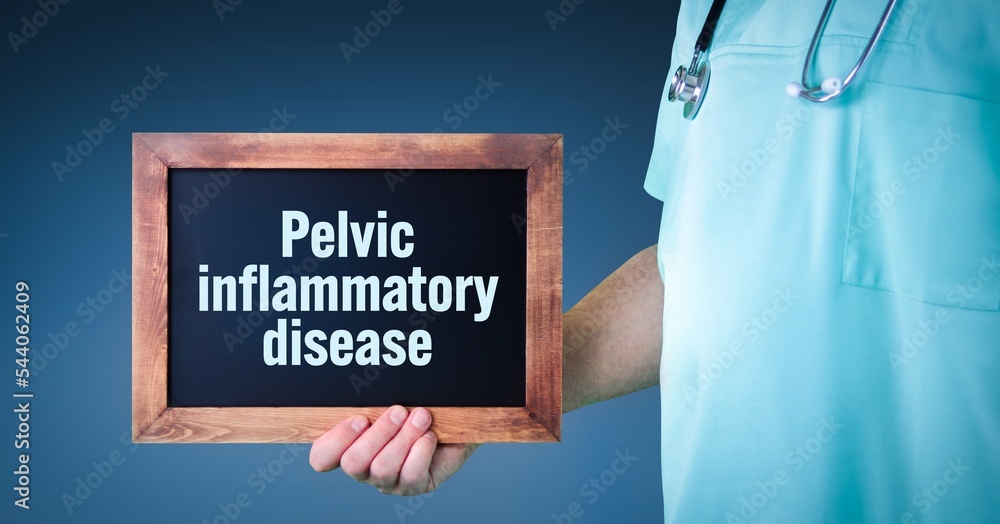 Pelvic inflammatory disease. Doctor shows sign/board with wooden frame ...