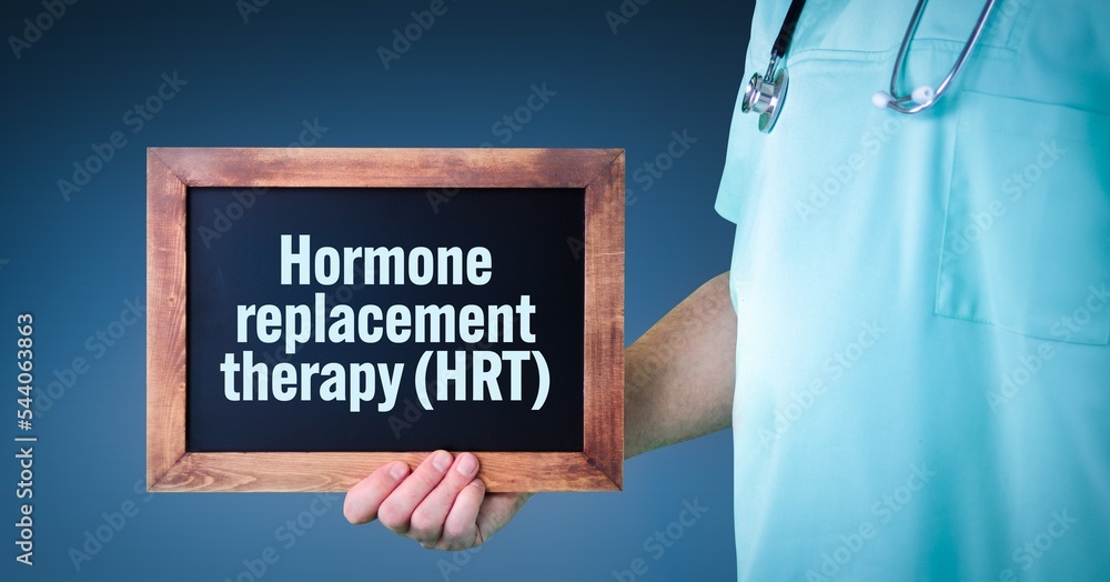Hormone replacement therapy (HRT). Doctor shows sign/board with wooden ...