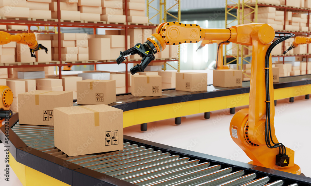 Industrial robot arm grabbing the cardboard box on roller conveyor rack ...