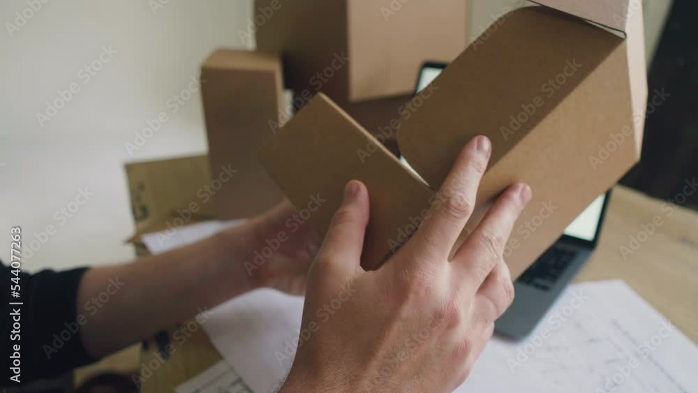 The designer works, comes up with the packaging design. Cardboard ...
