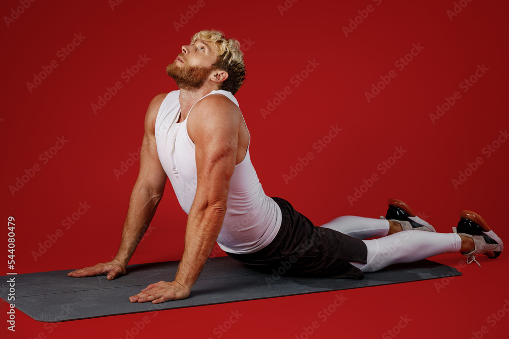 Full body side view young strong sporty toned sportsman man wear white ...