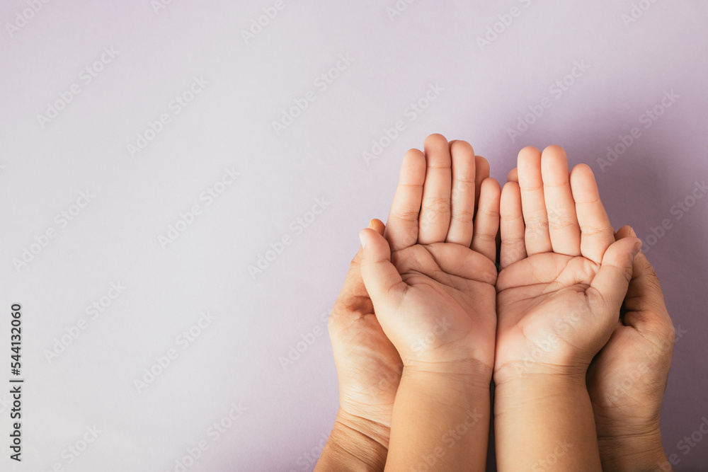 Top view parents and little kid holding empty hands together studio ...