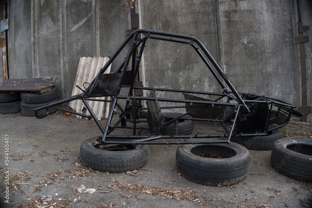 old black painted motorsport buggy frame under restoration Stock Photo ...