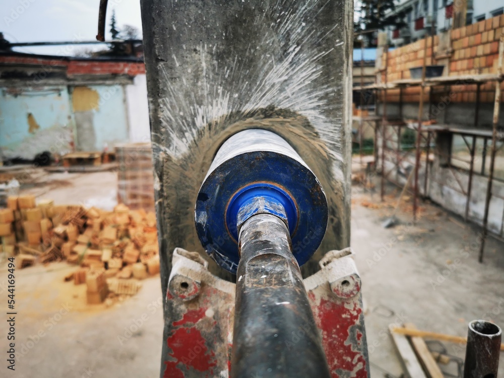 Hole cutting machine. Drilling concrete with an industrial drilling ...