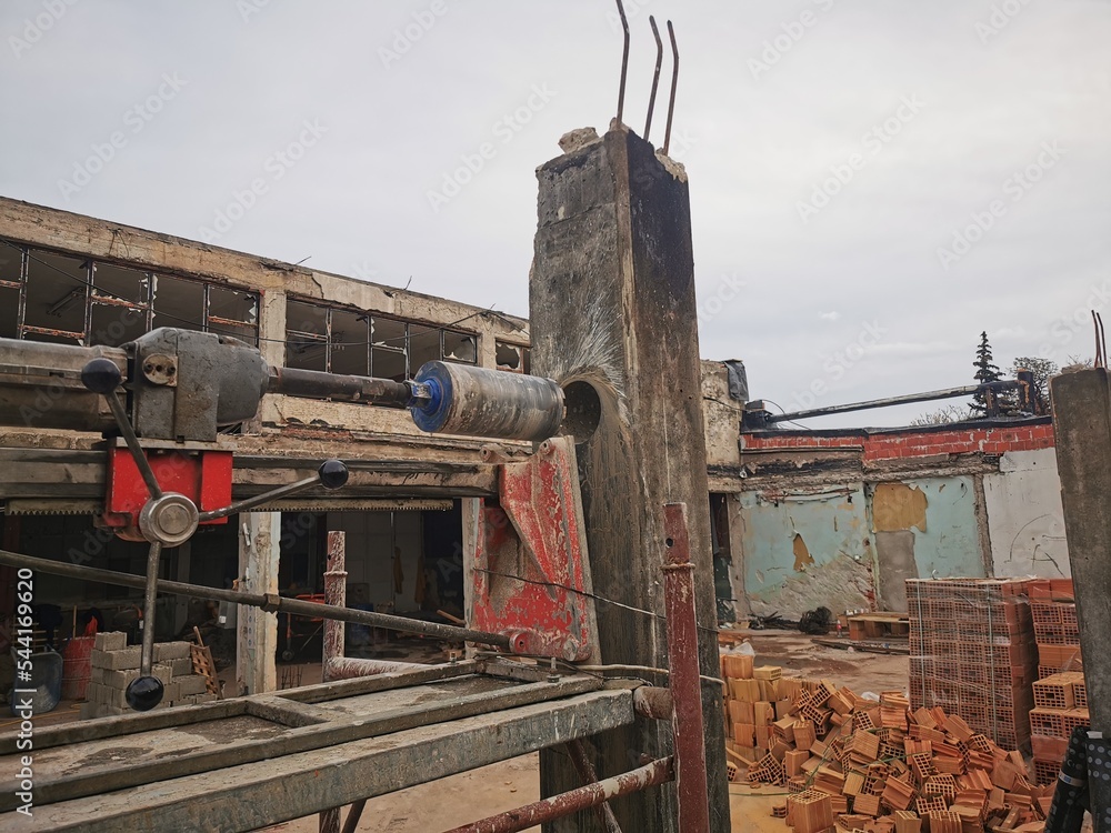 Hole cutting machine. Drilling concrete with an industrial drilling ...