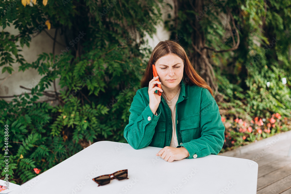 Upset young woman talking over phone disappointed hear bad news, sad ...