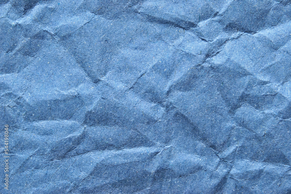 Blue wrinkled paper texture, a sheet of recycled wrinkled blue color ...