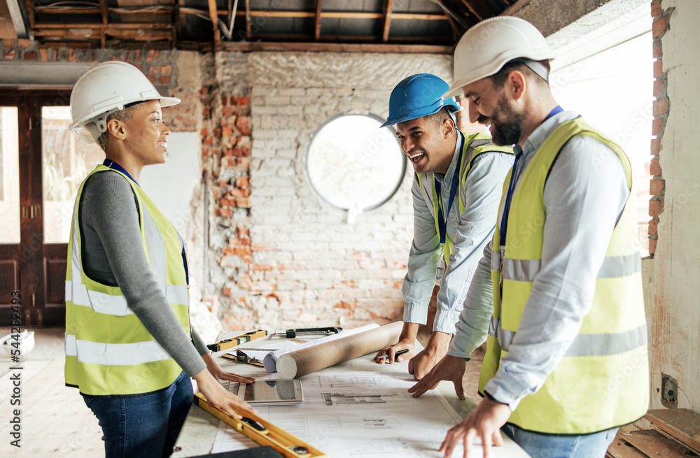 Construction team planning a building blueprint project on site with ... Construction team planning a building blueprint project on site with ...