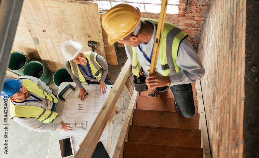 Top view, construction building and team planning with blueprint ...