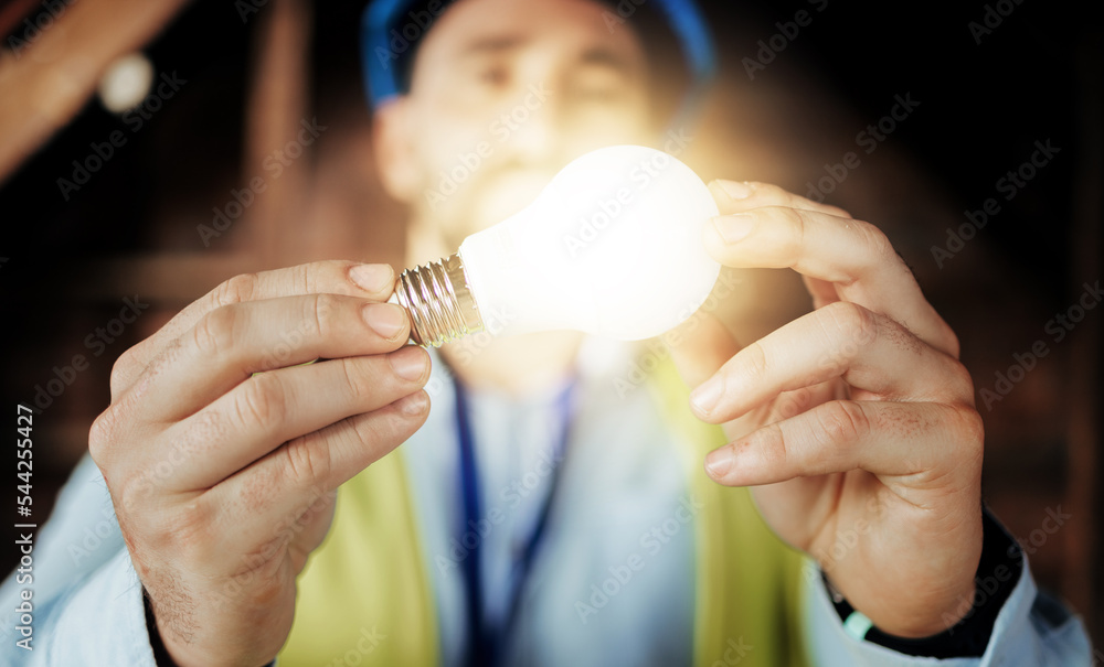 Idea, light and man engineer holding a lightbulb for vision, innovation ...