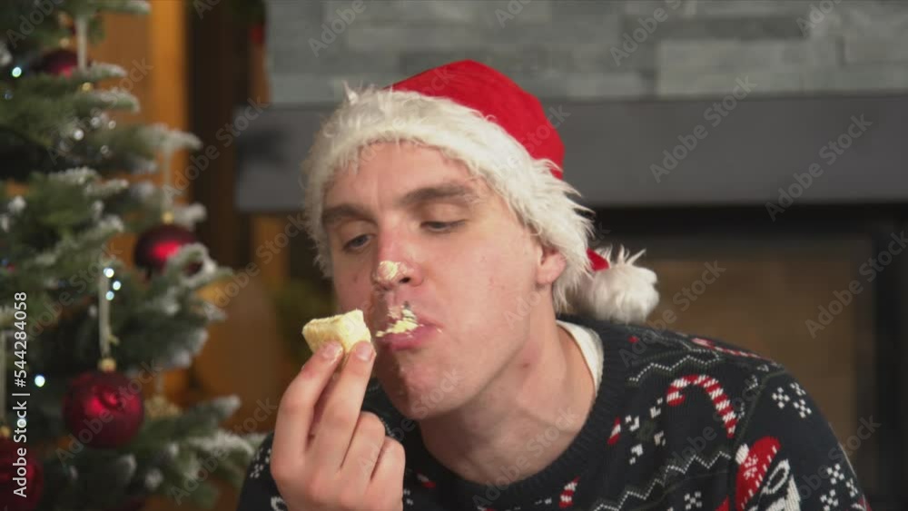 PORTRAIT: Man eats delicious Christmas dessert and his face is smeared ...