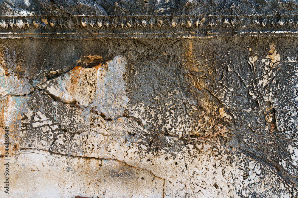 Ancient Greek antique text and inscriptions on the stone wall of the ...