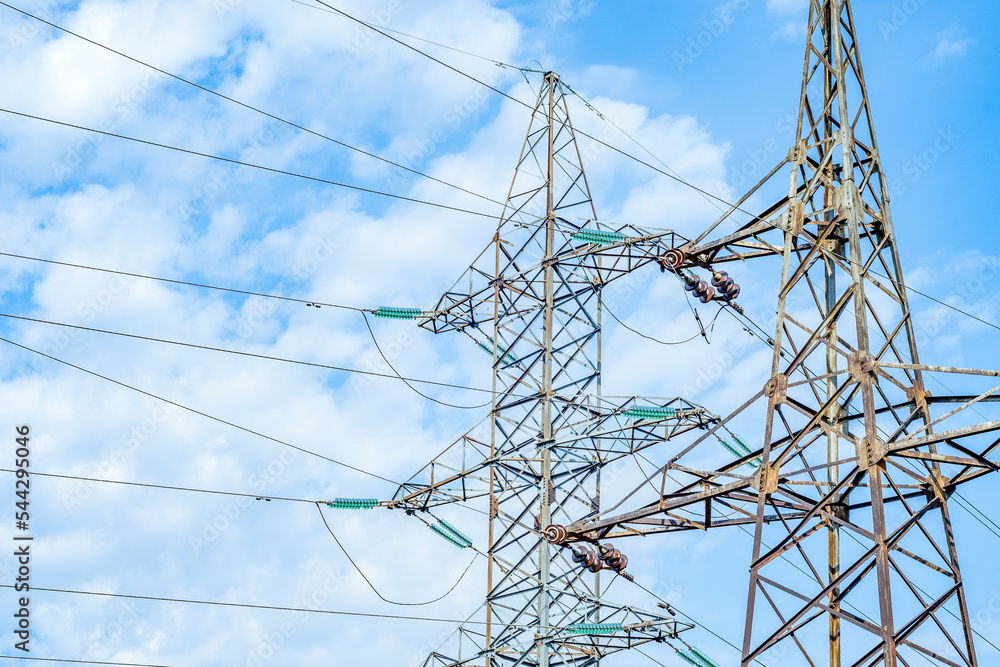 Countryside electric power transmission line on the background of the ...