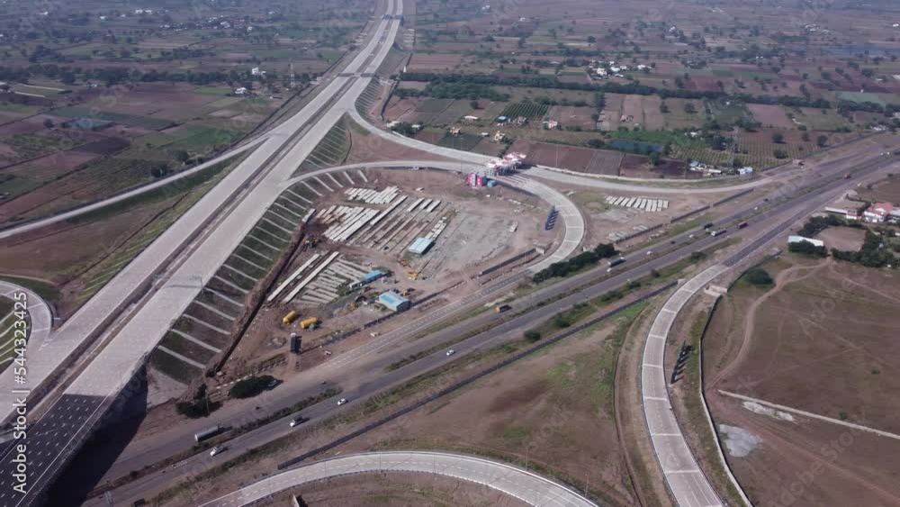 Orbiting aerial view of the Interchange of Samruddhi Mahamarg or Nagpur ...
