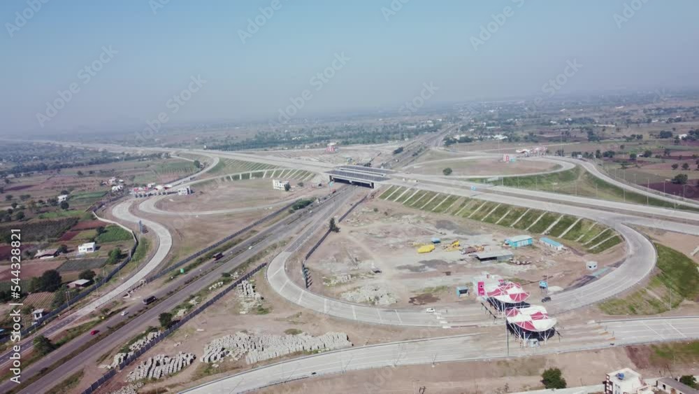 Orbiting aerial drone view of the Interchange of Samruddhi Mahamarg ...