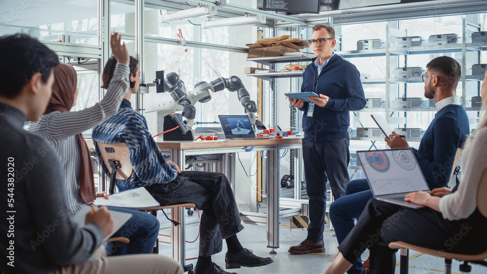 University Robotics Lecture: Teacher Explaining Engineering to Students ... University Robotics Lecture: Teacher Explaining Engineering to Students ...