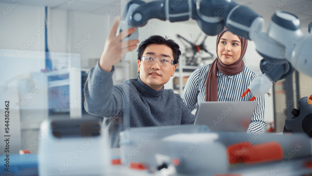 Arabic Female Future Engineer Looks At Work of Skilful Developer. Asian ...