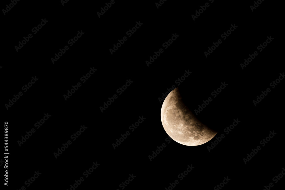 The partial lunar eclipse is caused by the earth moving between the sun ...