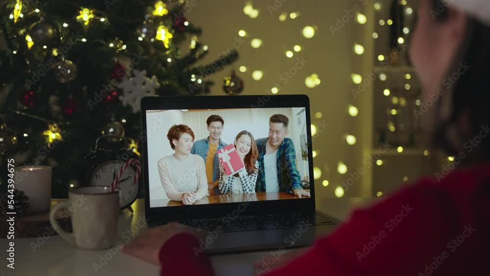 woman wearing santa hat celebrating christmas and Happy New Year social ...