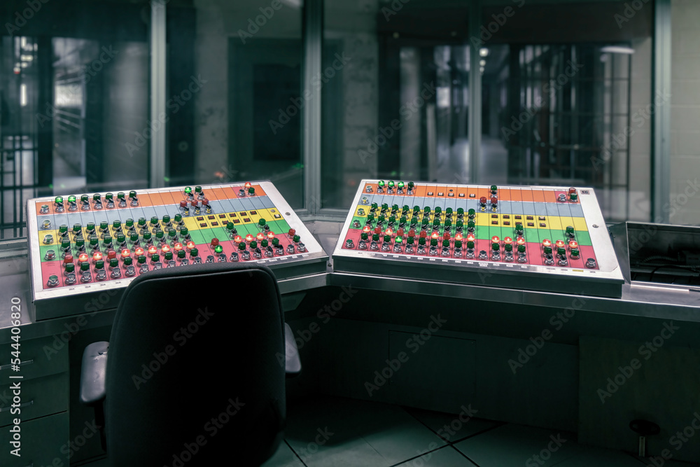 Penitentiary guard control room with two electrical panels with ...