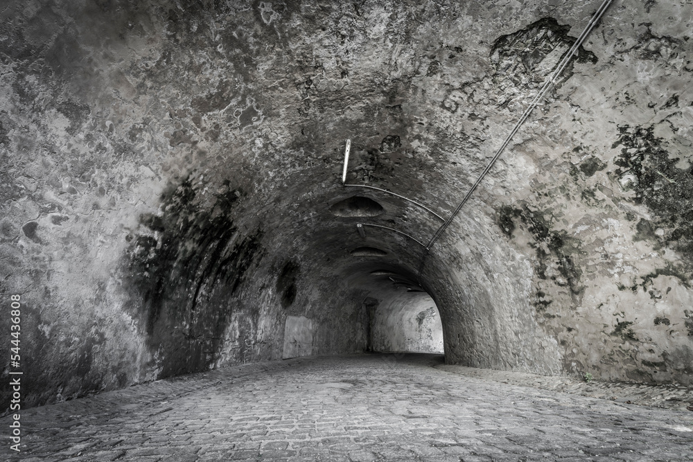 Underground tunnel in a historic castle. Stock Photo | Adobe Stock