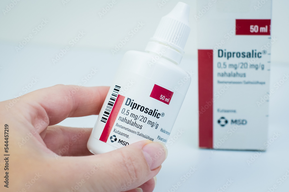 Tallinn, Estonia - October 19, 2022: Hand holding Diprosalic skin ...