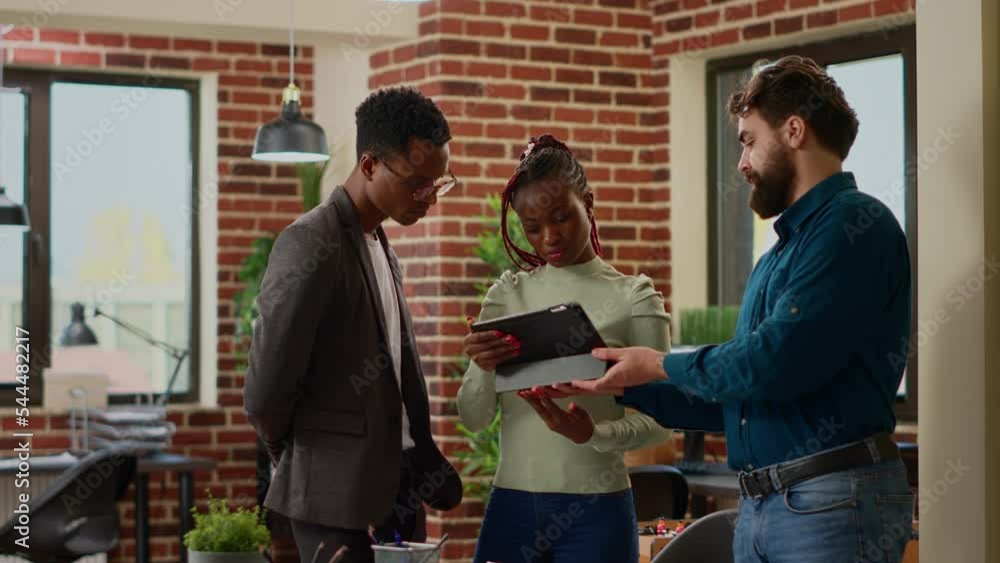 Diverse team of people doing teamwork to plan report analysis, working ...