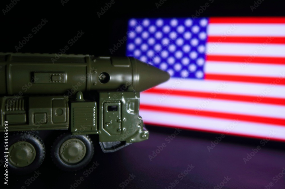 Model of a missile system directed towards the American flag, the ...