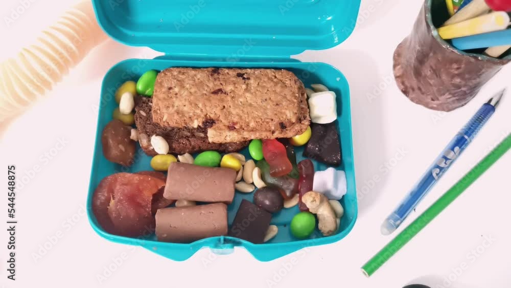School kids lunch box sweet snacks. Blue container healthy break meal ...