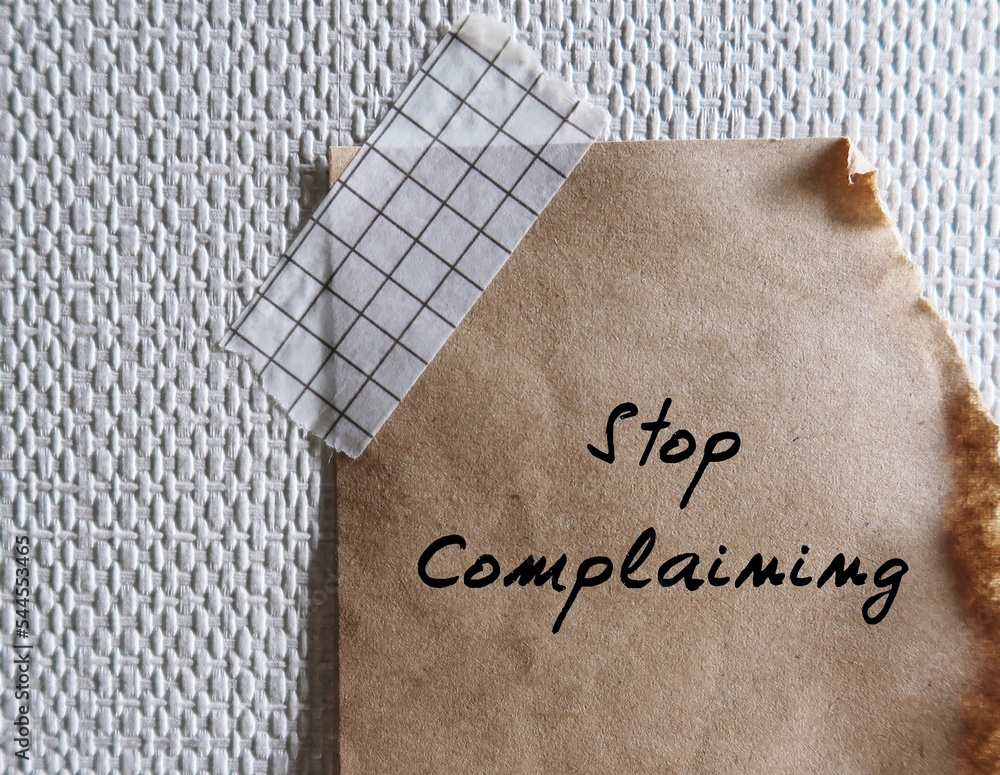 Photo & Art Print Torn paper stick on wallpaper with handwriting STOP ...