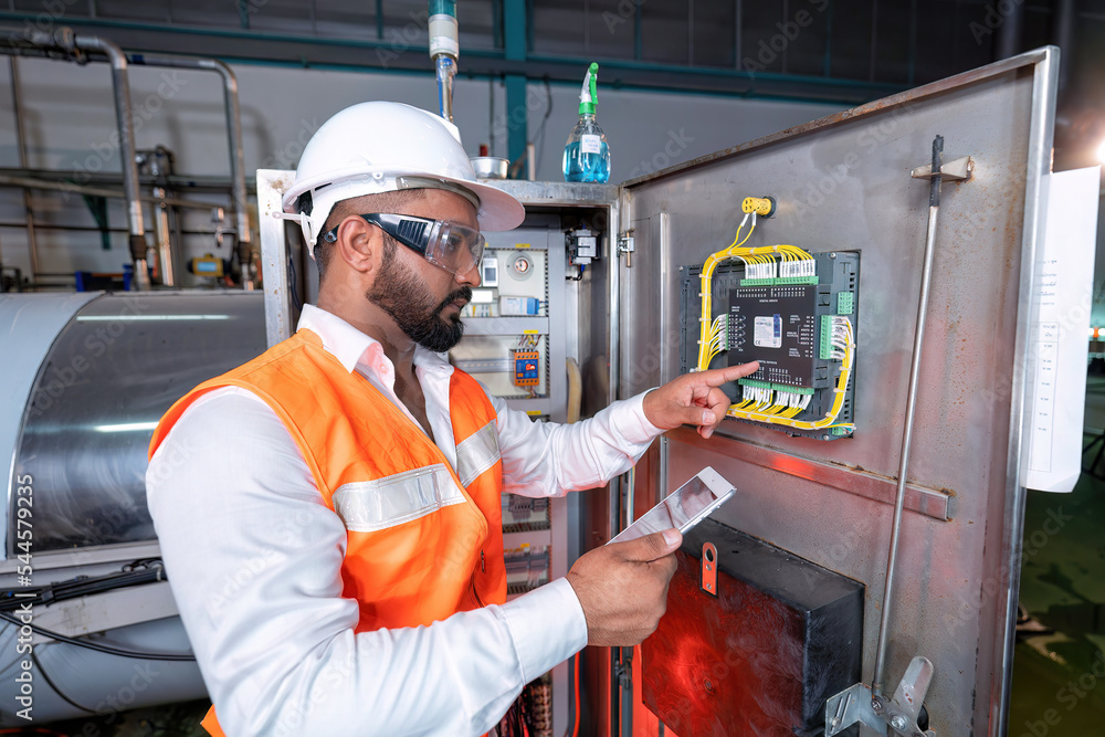 Electrical engineer inspection control panel and commissioning during ...